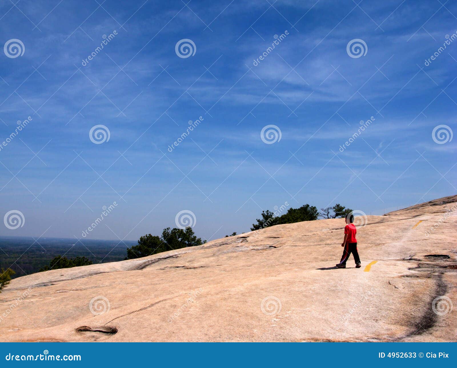 Stone Mountain In The Autumn Forest With Fallen Leaves Royalty-Free ...