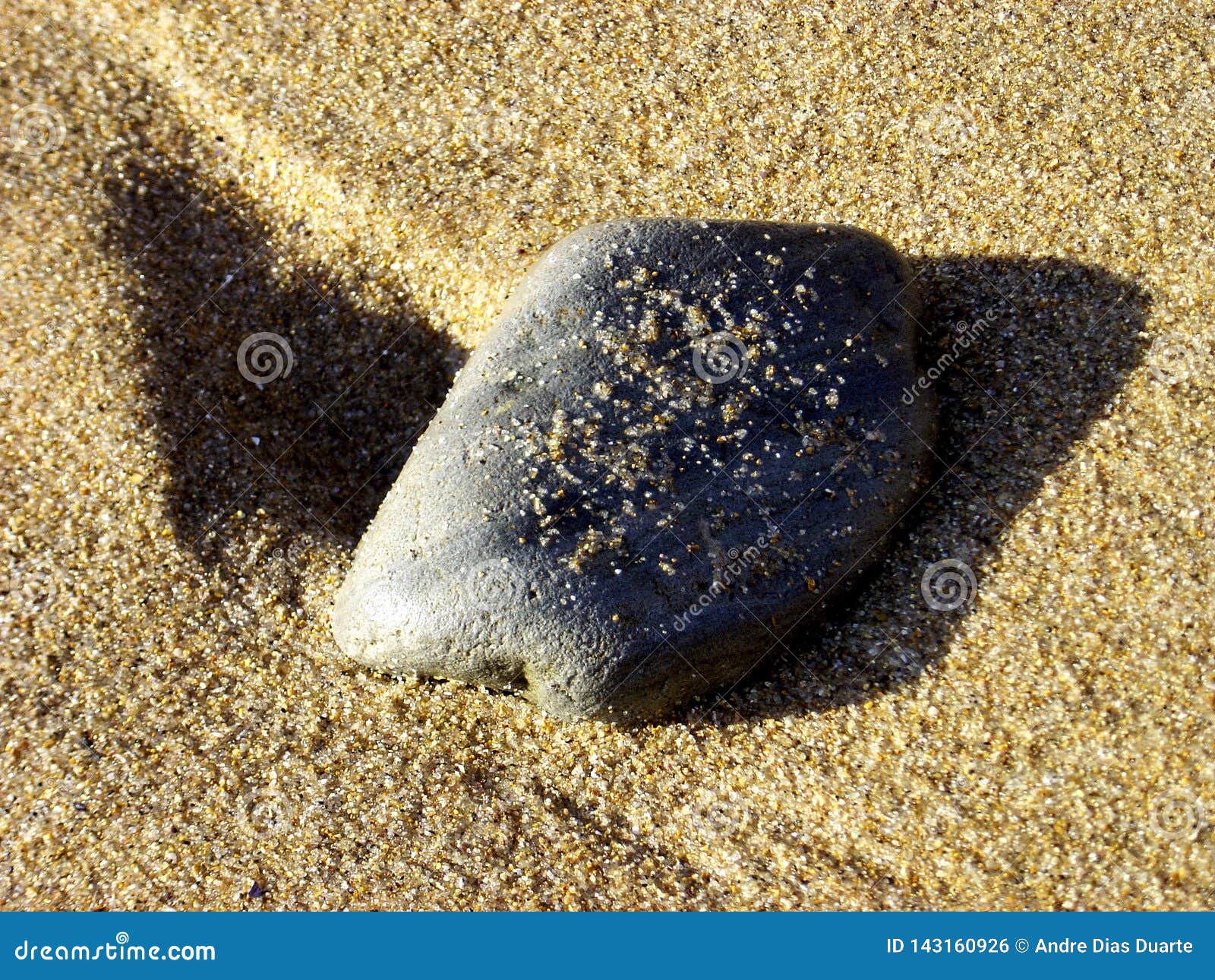 Stone Over Sand with Shadow Stock Photo - Image of sandbox, grain ...