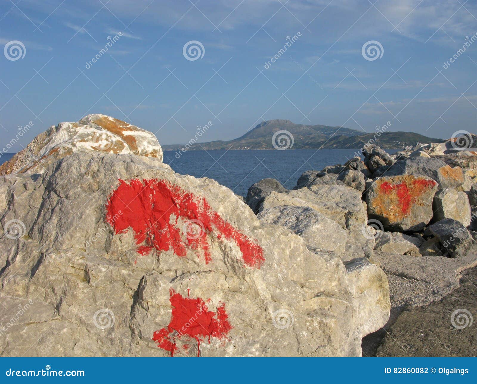 Stone painted in red color stock photo. Image of outdoors - 82860082