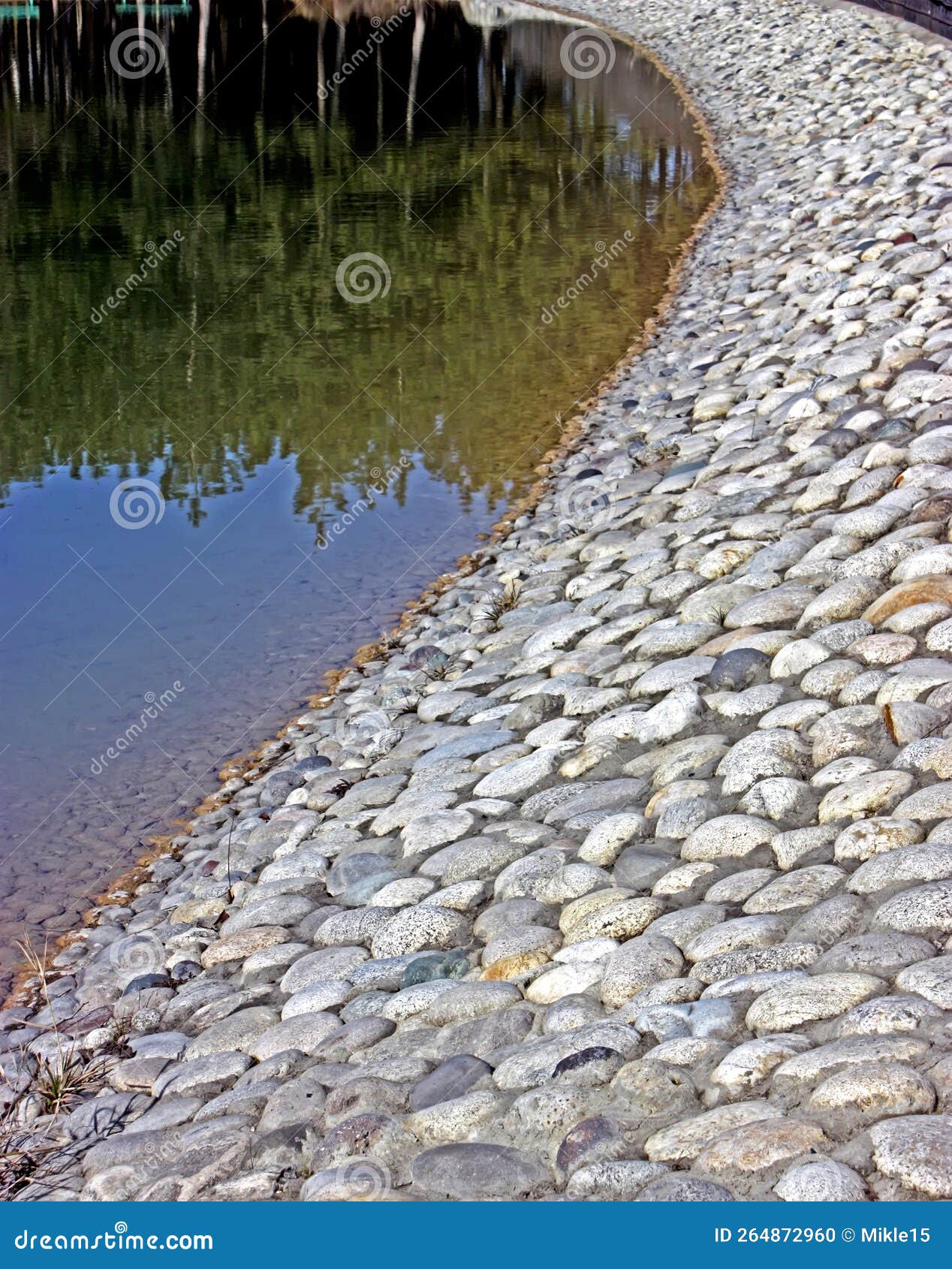 Stone path by the water stock photo. Image of pattern - 264872960
