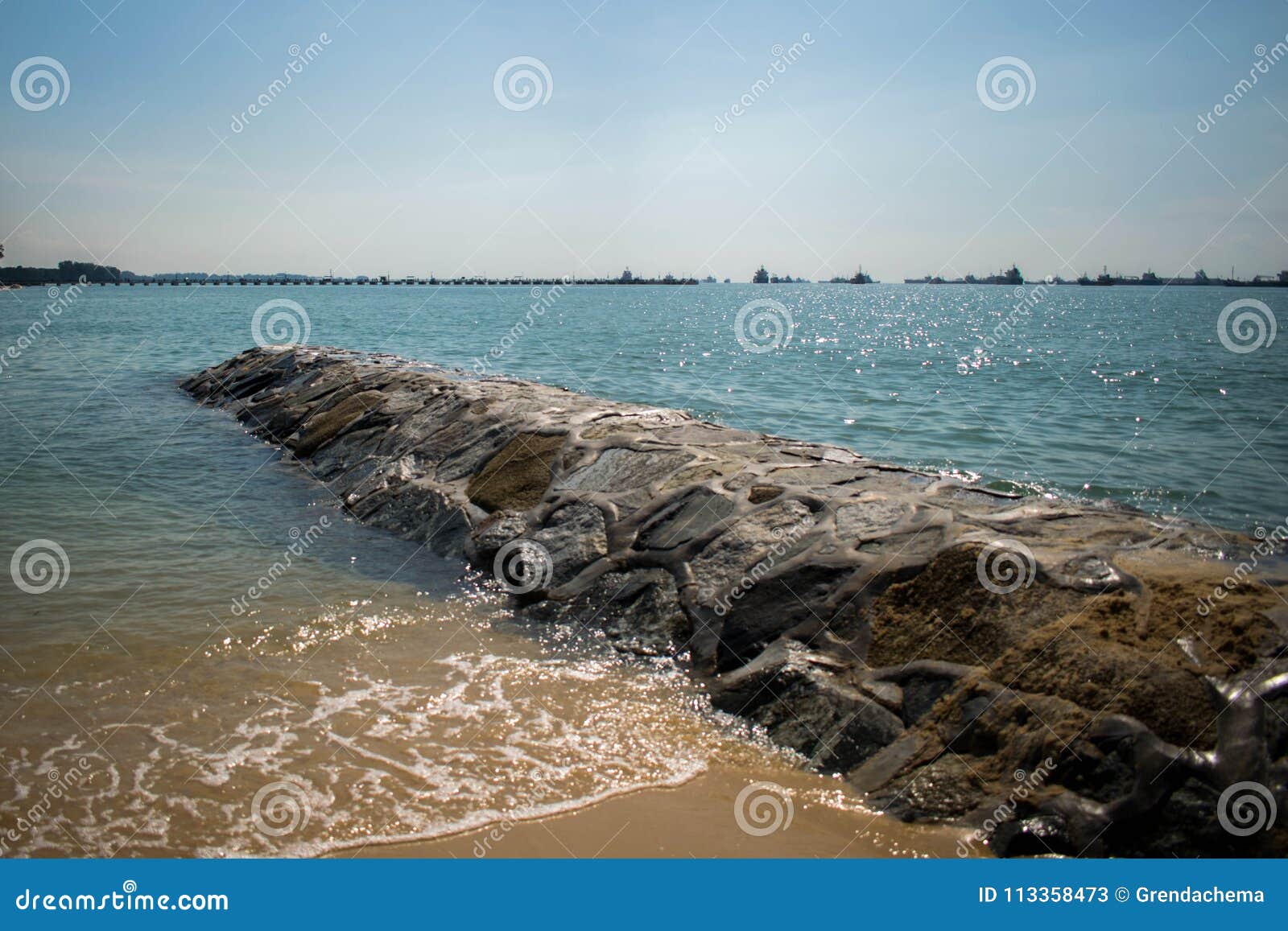 Stone Pathway on the Water at a Port Stock Image - Image of rock, water ...