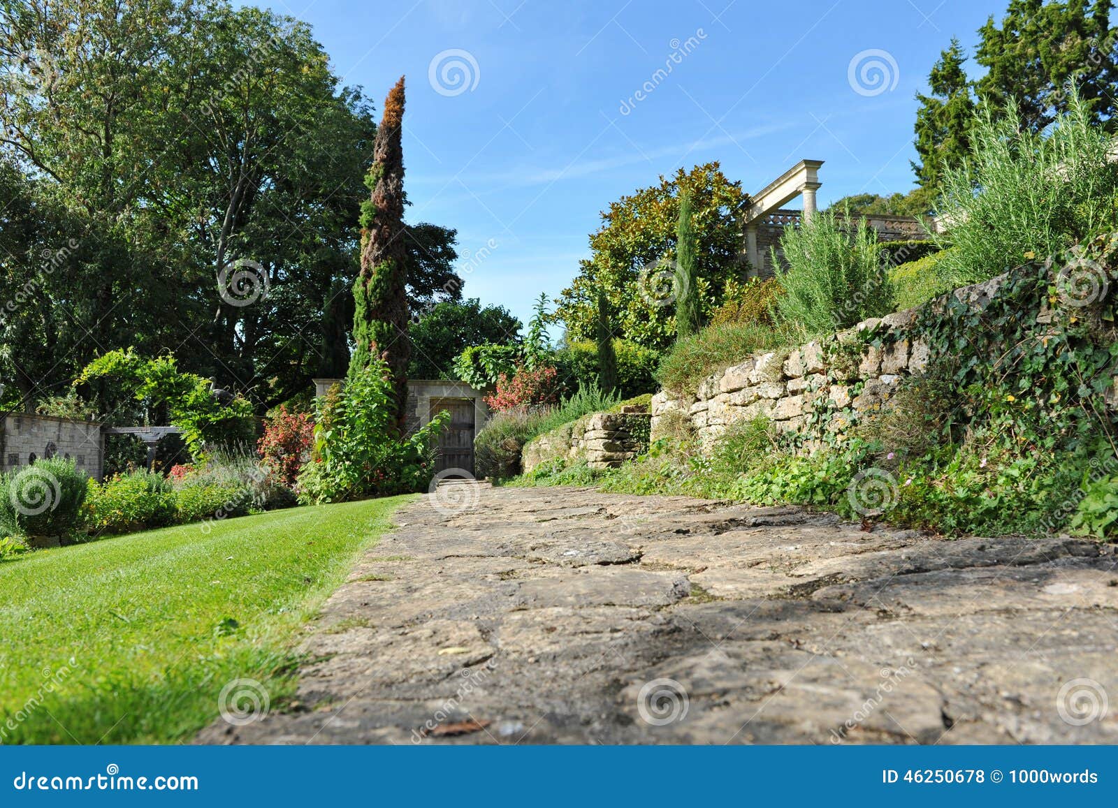 Stone Paved Garden Path stock photo. Image of houses - 46250678