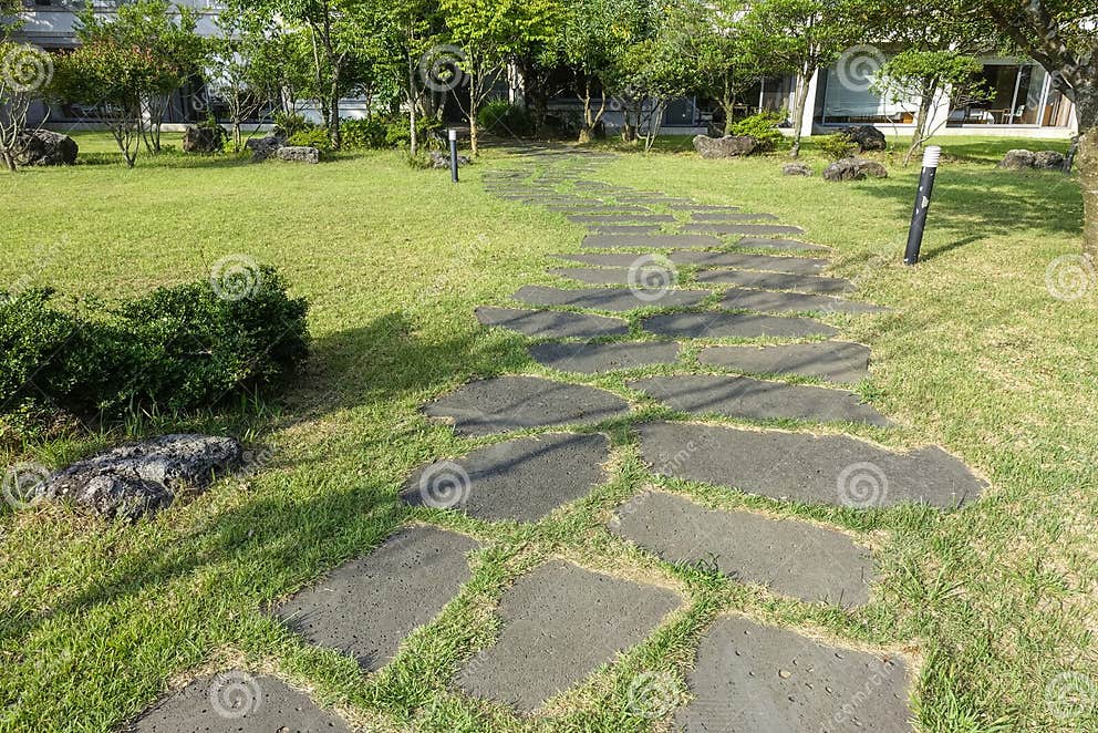 Stone Paved Road with Grass Stock Image - Image of asphalt, countryside ...