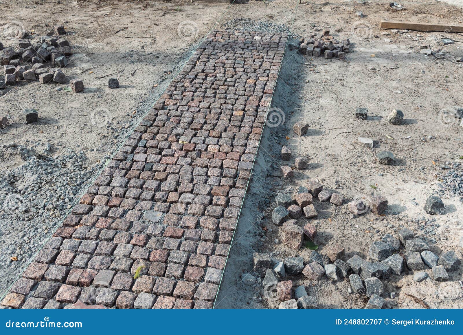 Stone Pavement, Construction Worker Laying Cobblestone Rocks on Sand ...