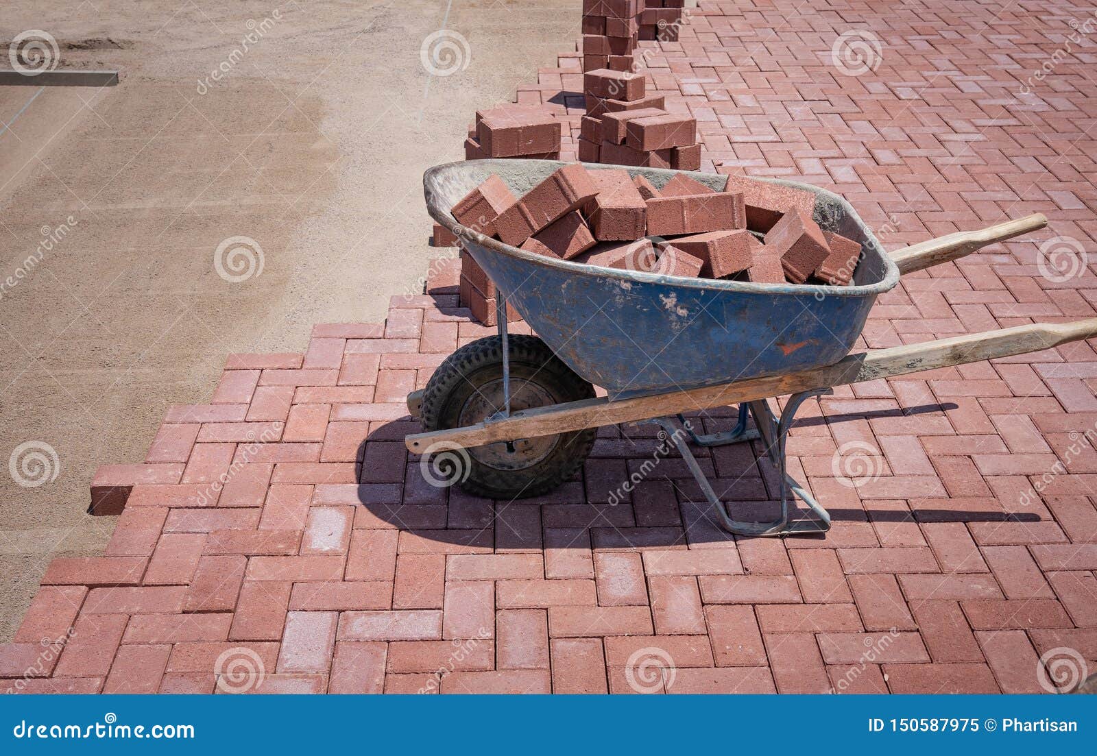 Stone Pavers Bricks Being Layed on Ground for Landscaping Project ...