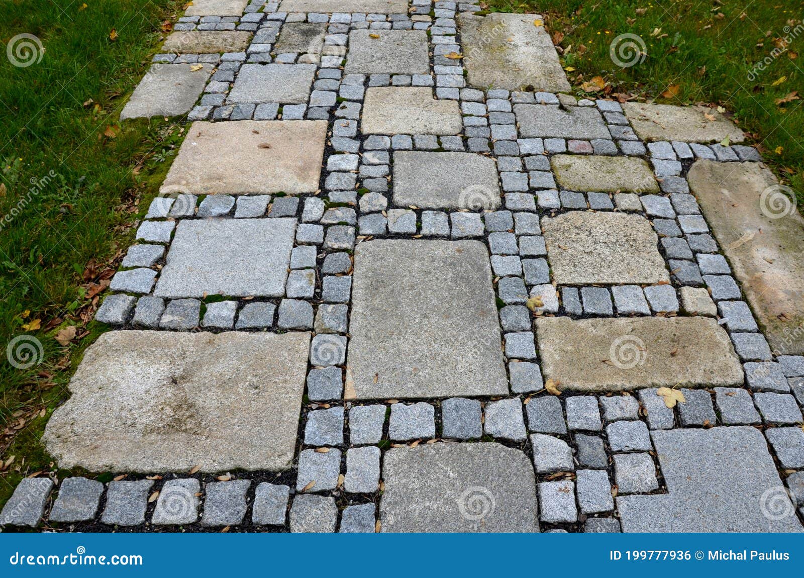 Stone Paving with a Geomentric Pattern, a Large Rectangular Tile Lined ...