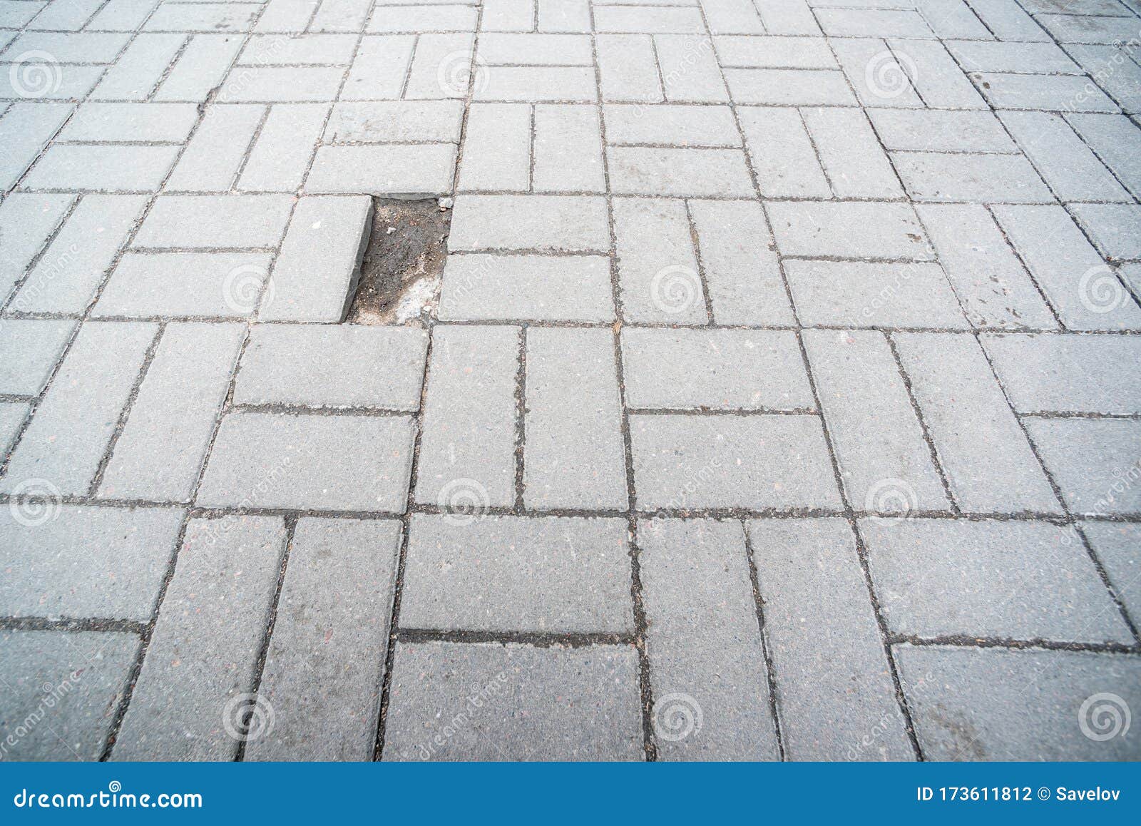 Stone paving with a hole stock photo. Image of block - 173611812