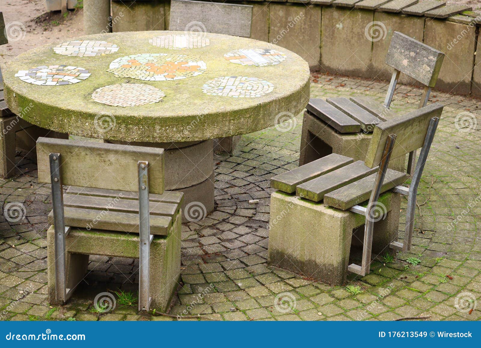 Stone Picnic Table with Chairs Covered in Mosses in a Park at Daytime ...