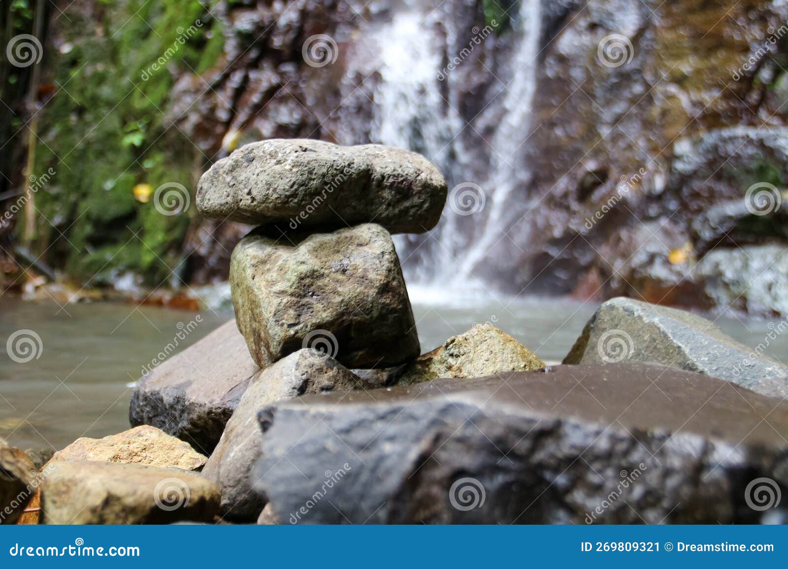 Stone Pile in Front of Waterfall in the Tropical Forest Stock Image ...
