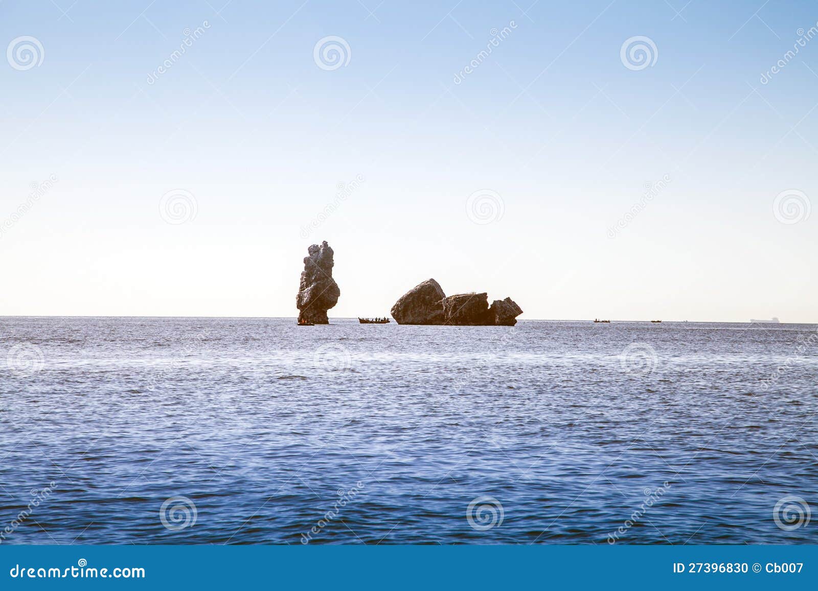 Stone pillar in the sea stock photo. Image of scenic - 27396830