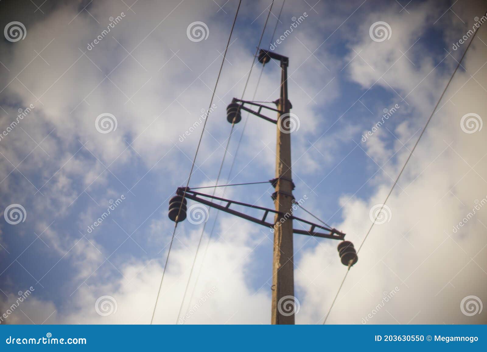 Stone Pillar with Wires in Cloudy Blue Sky Background Stock Photo ...