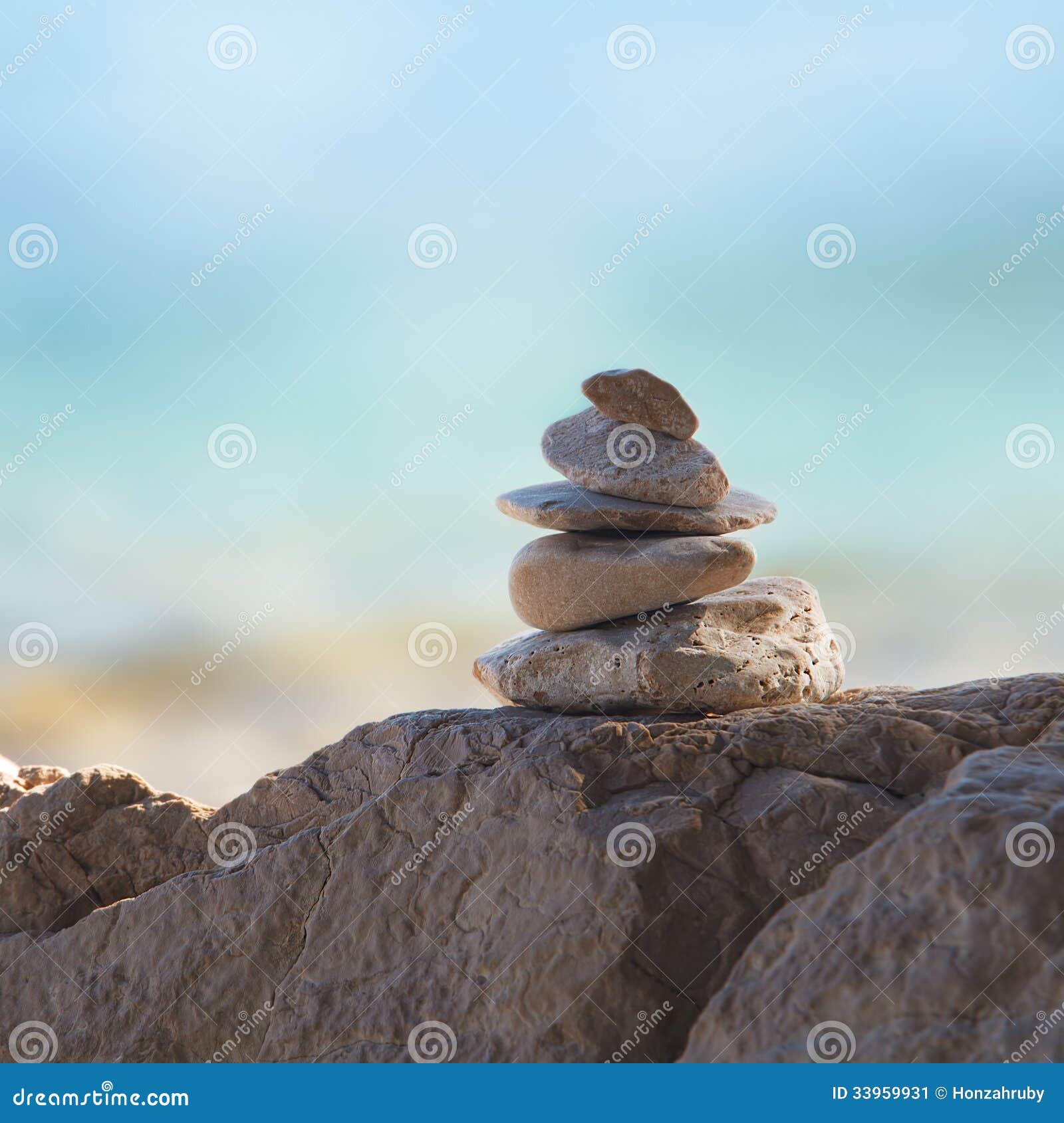 Stone Pyramid on the Rock on the Beach Stock Image - Image of gray ...