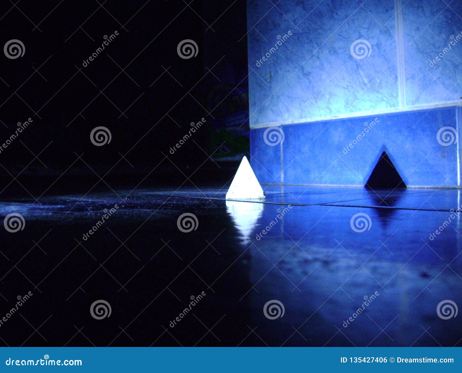 Stone Pyramid with Shadow and Reflection Stock Photo - Image of pyramid ...
