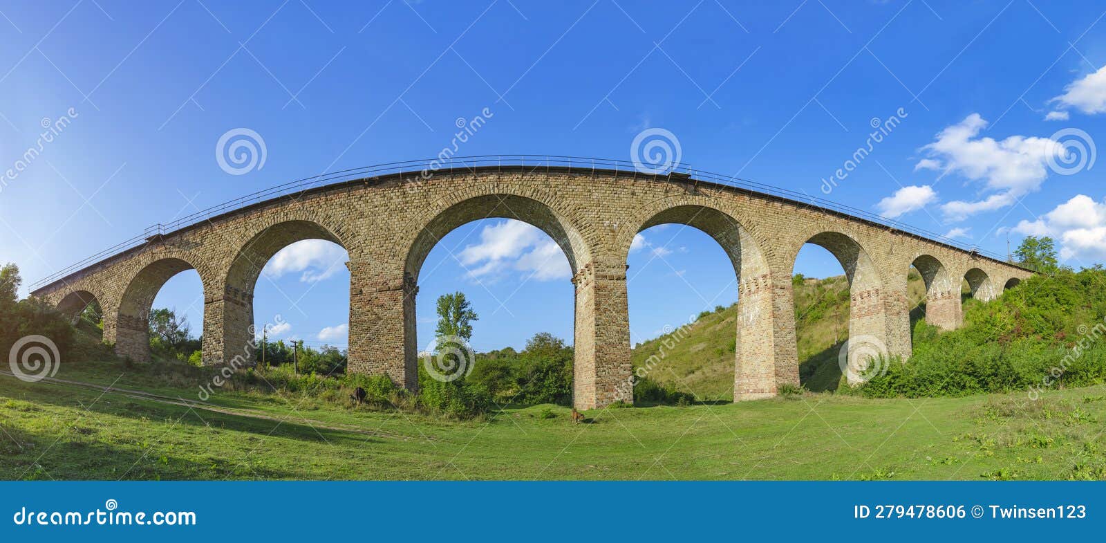 Stone Railway Ancient Arch Bridge Over the Green Valley Stock Photo ...