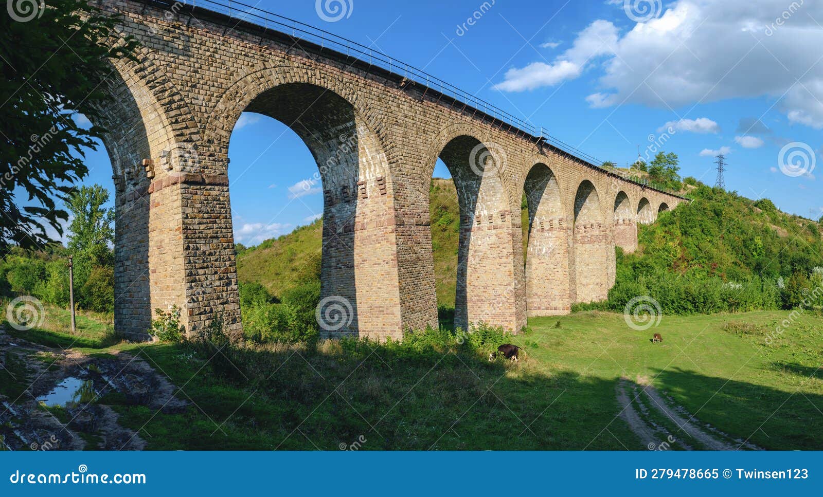 Stone Railway Ancient Arch Bridge Over the Green Valley Stock Image ...