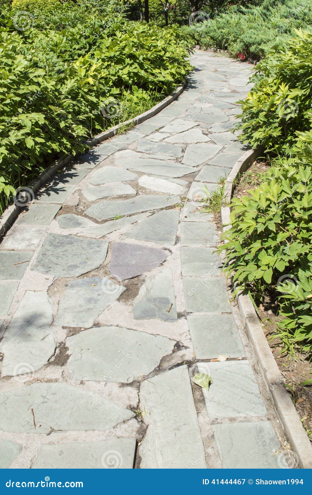 Stone road in the garden stock image. Image of cobbles - 41444467