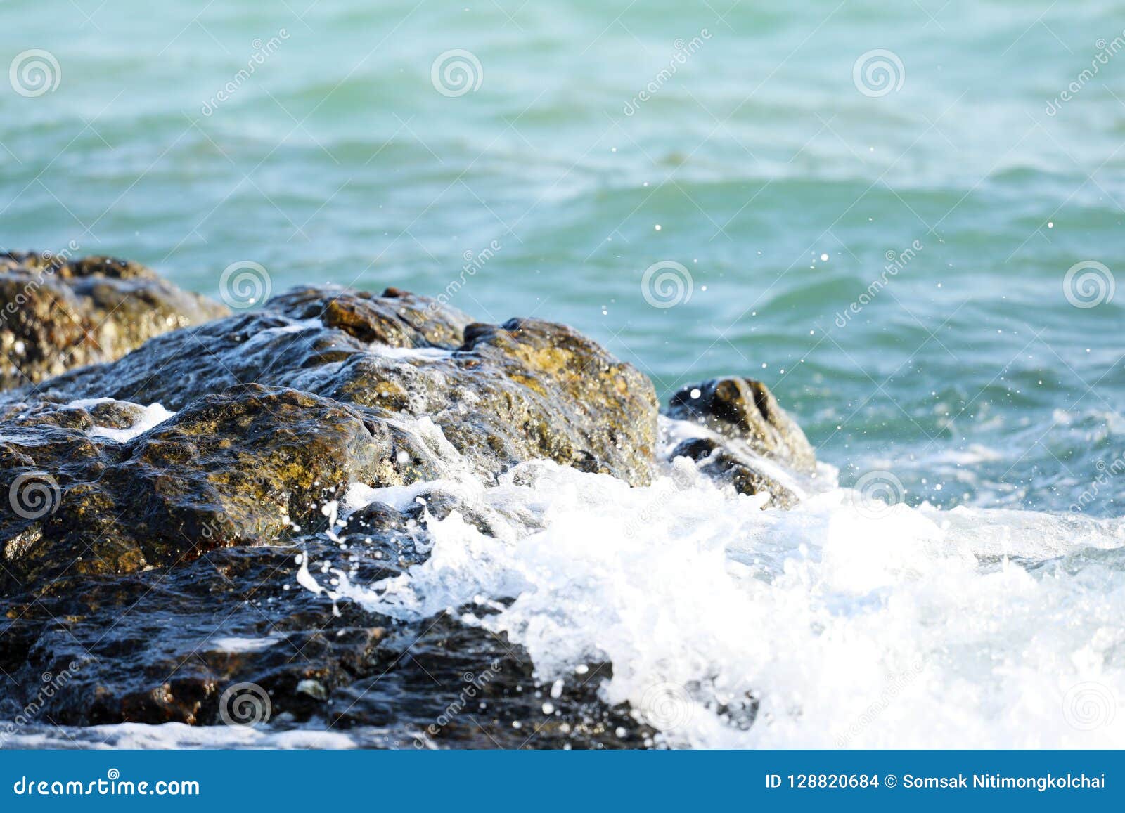 Stone or Rock Above or Below the Surface of the Sea. Stock Photo ...