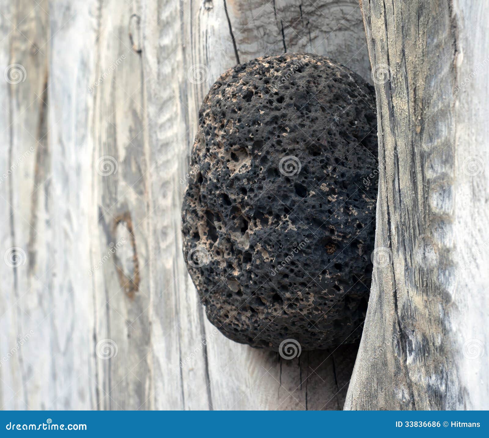 Stone Rock Embedded into a Wooden Texture Stock Photo - Image of ...