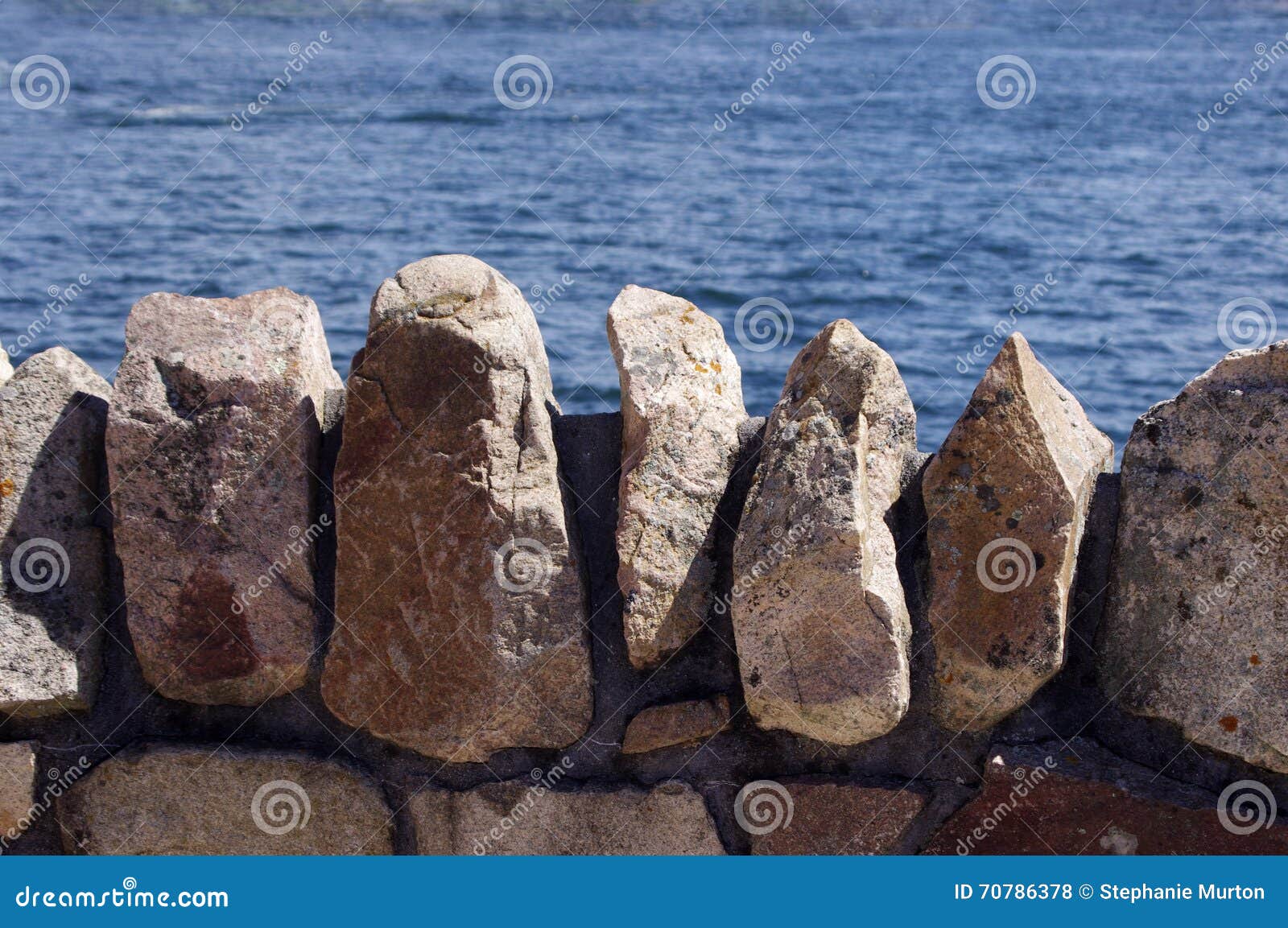 Stone rock wall stock photo. Image of ocean, wall, pointy - 70786378