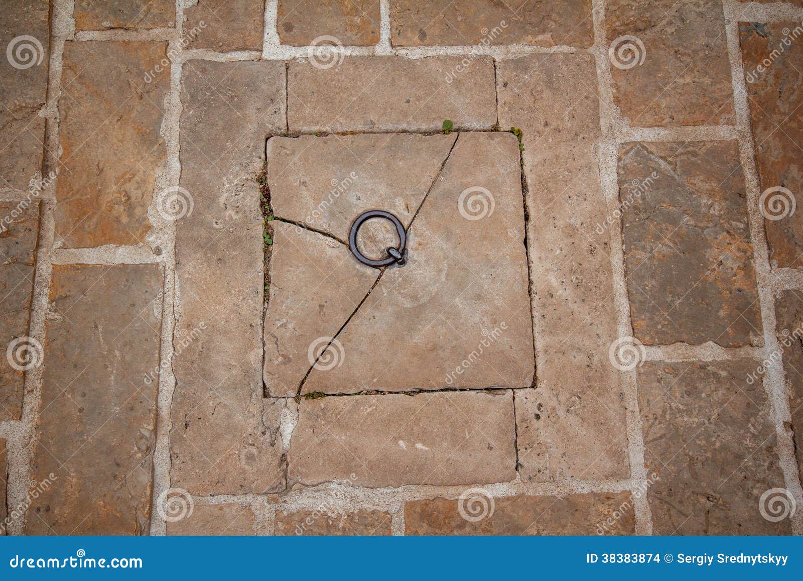 Stone Roof, Rusty Ring in the Midst of the Old Pavers Stock Photo ...