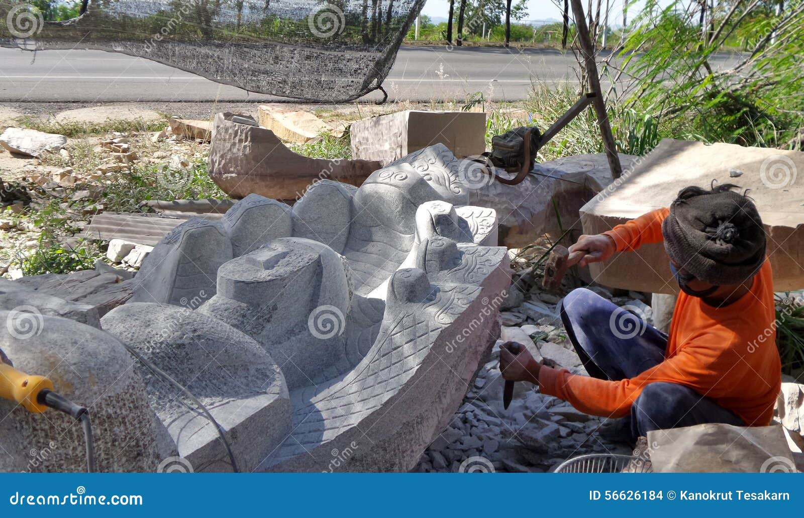 Stone sculptor at work stock photo. Image of surface - 56626184