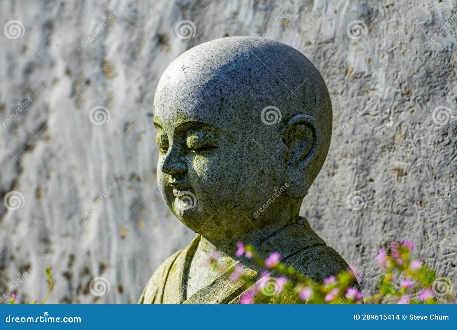 A Stone Sculpture of a Child Monk Stock Photo - Image of daytime ...