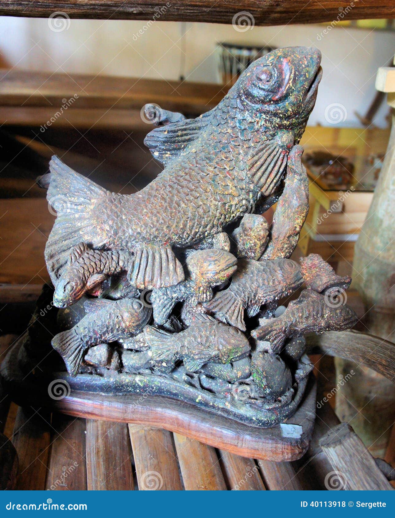 Stone sculpture. Fish stock photo. Image of color, statue - 40113918