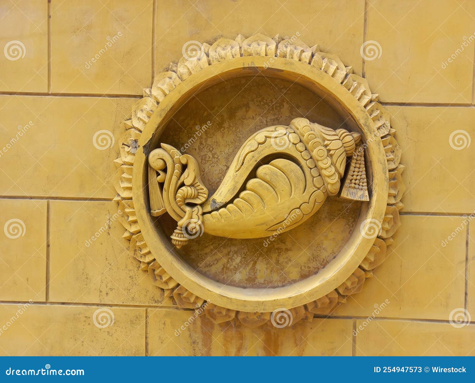 Stone Sculpture of the Hindu Shankha Hanging on the Wall Stock Image ...