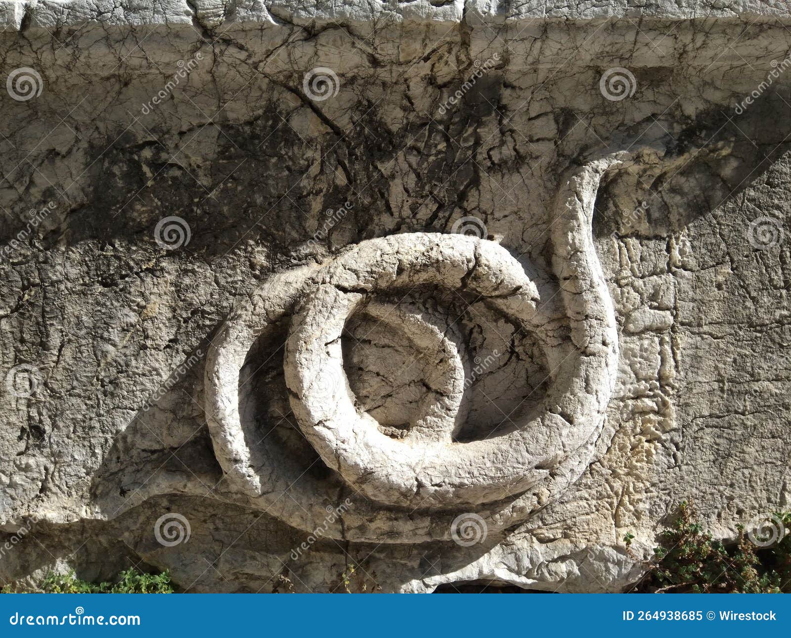 Stone Sculptured Statue of a Snake on Grunge Stone Wall Stock Image ...