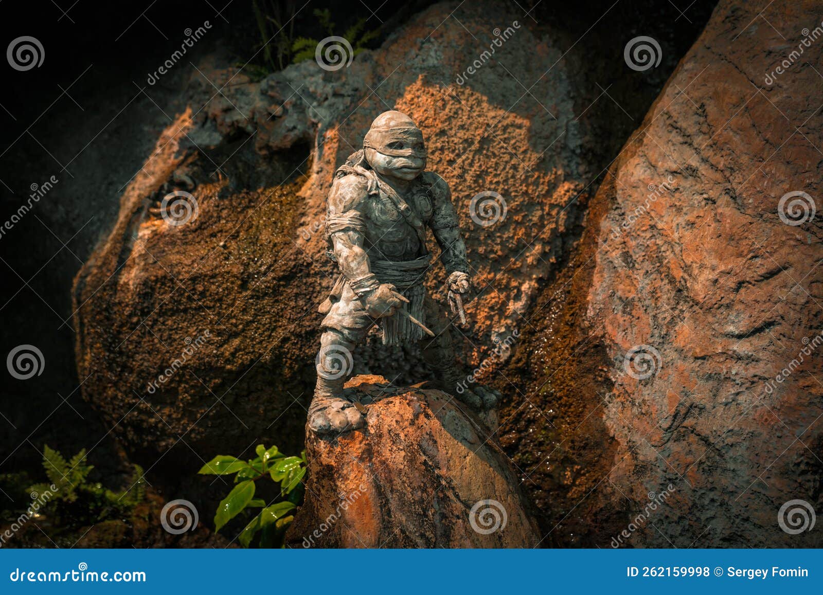Stone Sculptures of Ninja Turtle at the Waterfall Stock Photo - Image ...