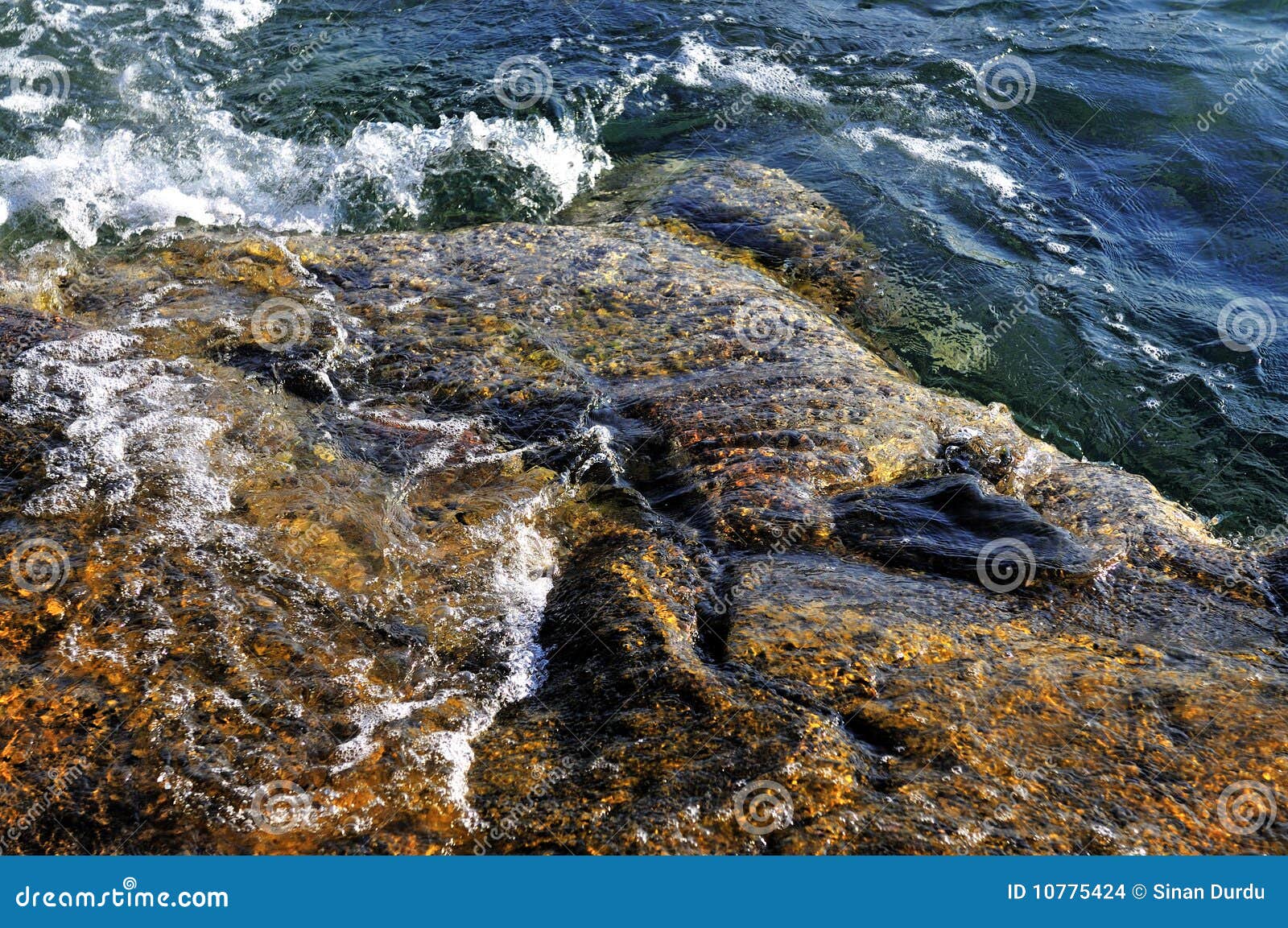 Stone in sea stock photo. Image of bodrum, wave, strand - 10775424