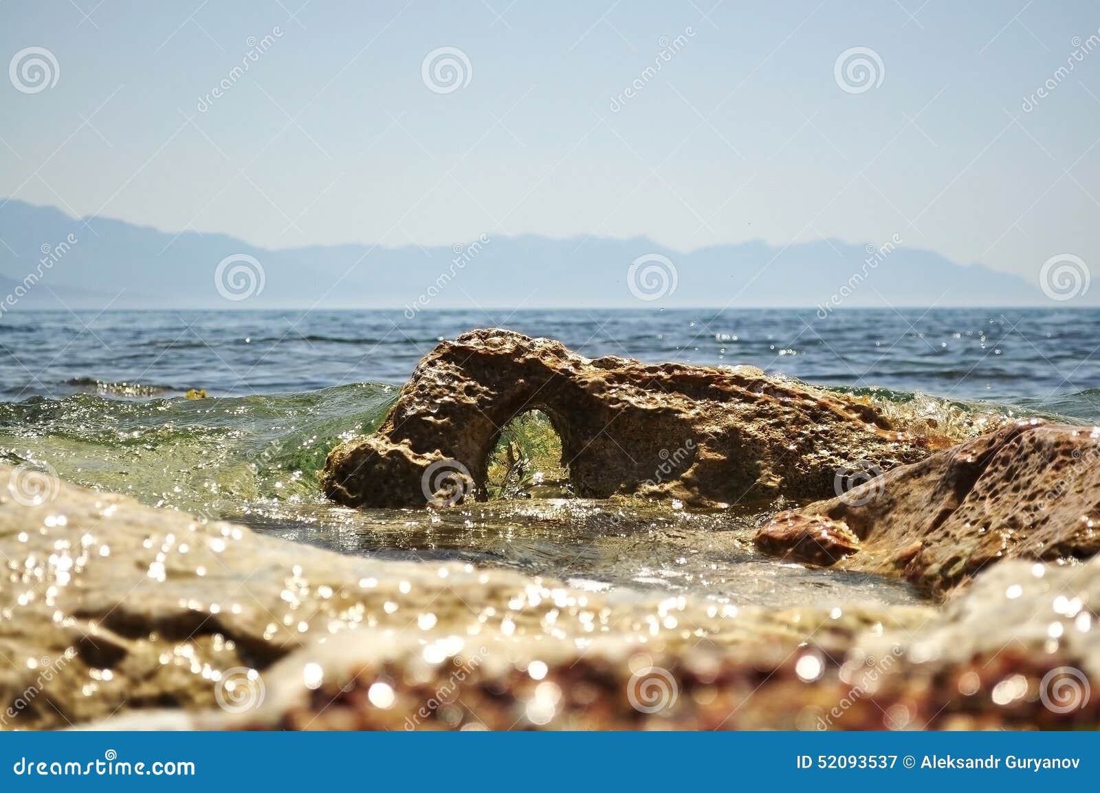 Stone in the sea stock image. Image of waves, view, stone - 52093537