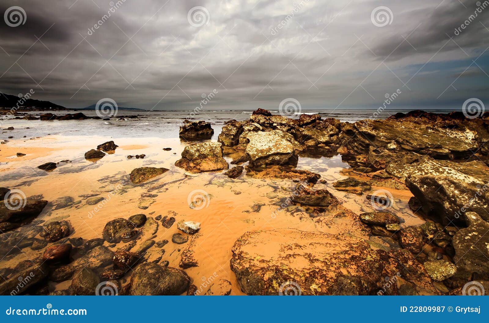 Stone sea shore stock image. Image of remote, water, stones - 22809987