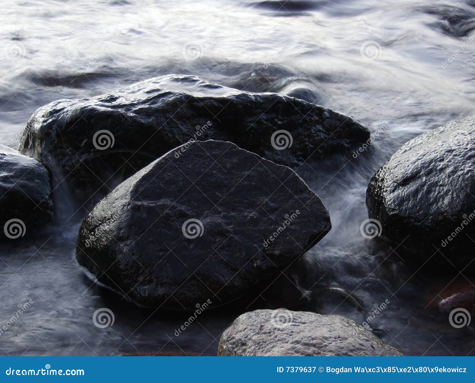 Stone in the sea water stock image. Image of poland, long - 7379637