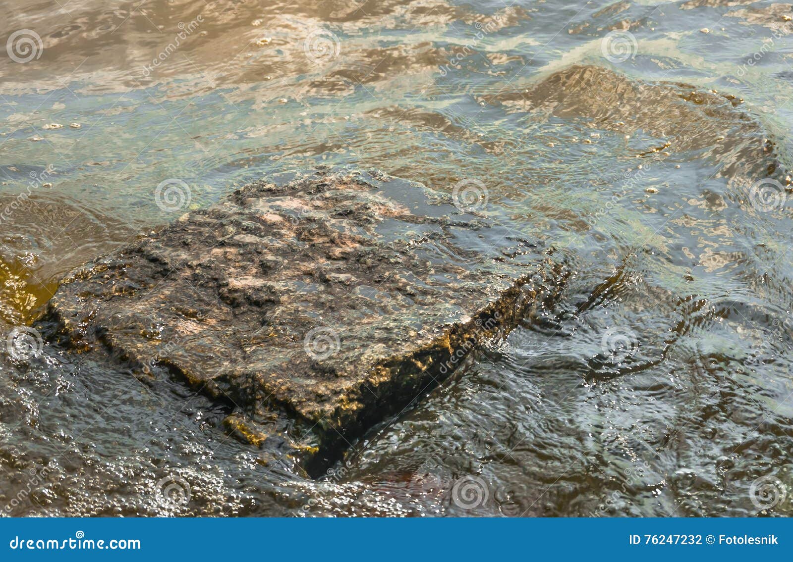 Stone in sea water stock photo. Image of background, granite - 76247232