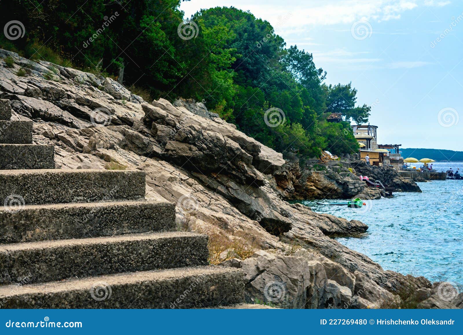 Stone slope on the beach stock photo. Image of beautiful - 227269480