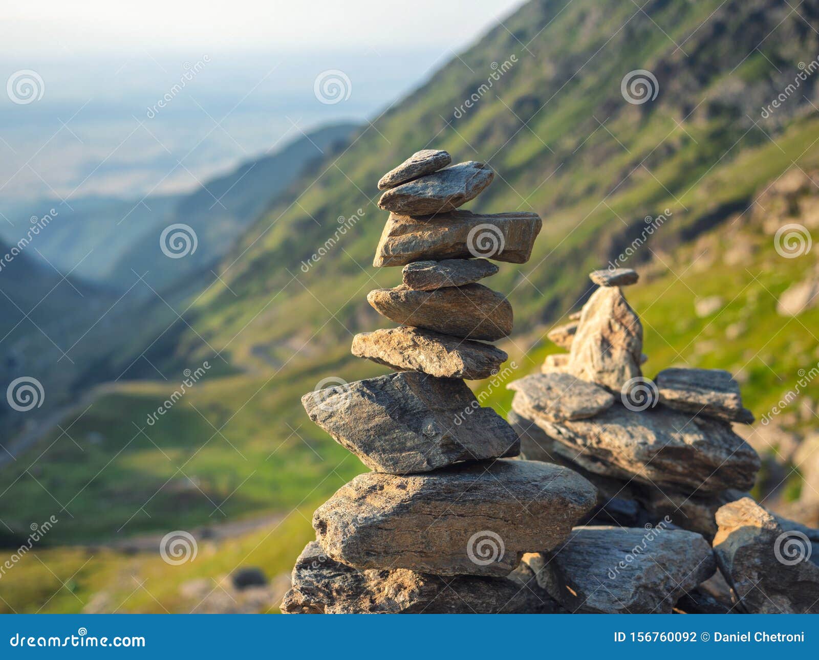 Stone Stack with Balanced Stones on Blurred Mountain Background in ...