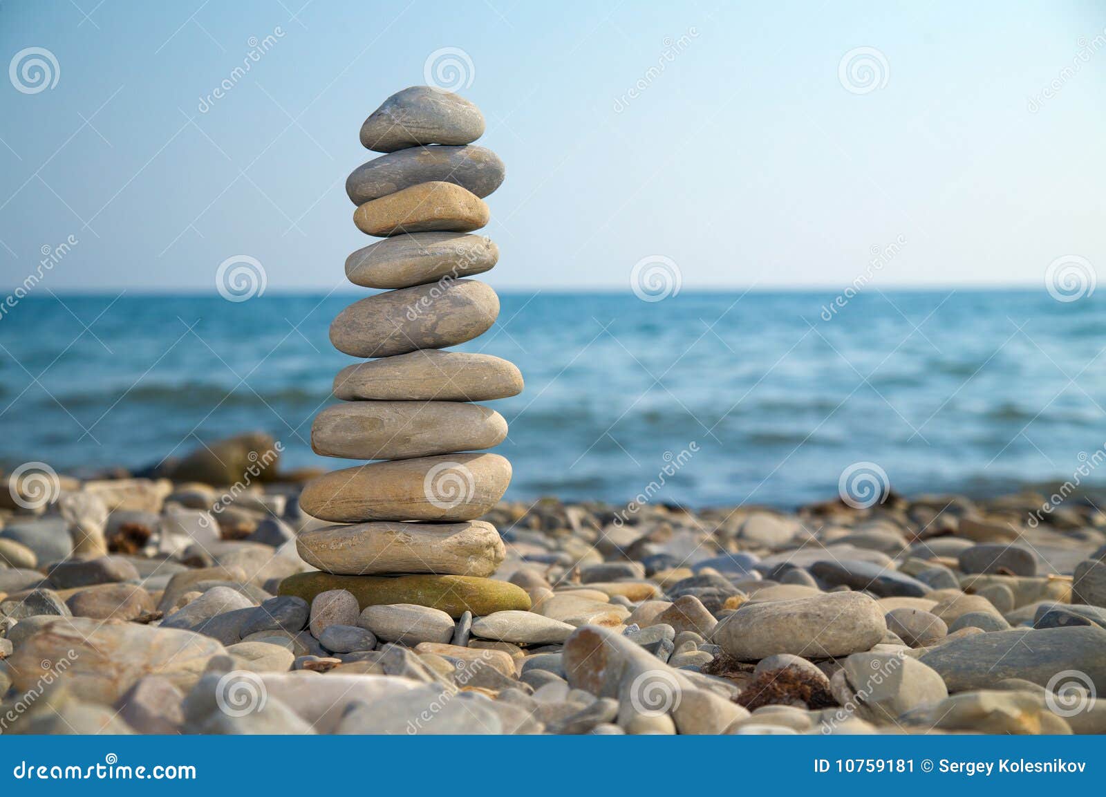 Stone Stack on a Pebble Beach Stock Image - Image of beauty, ocean ...