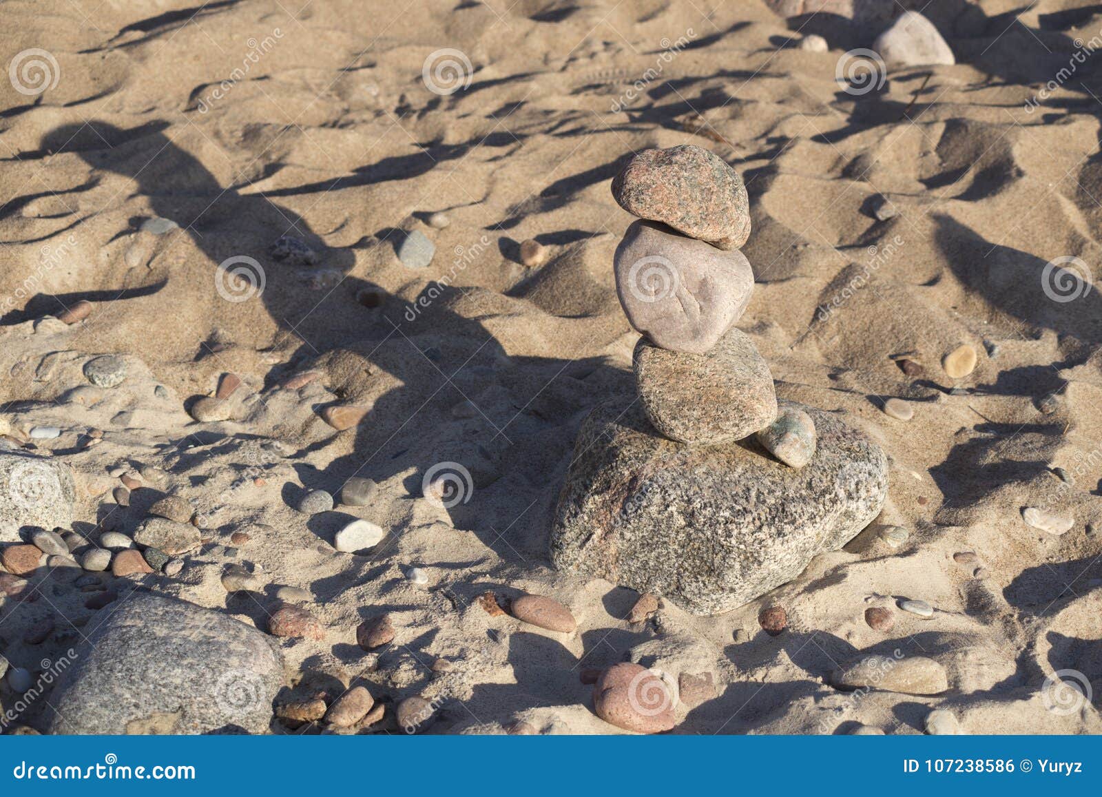 Stone stack on sand stock photo. Image of sunny, relax - 107238586