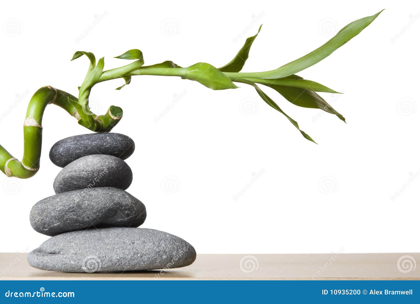 Stone Stack and Spiral Bamboo Stock Photo - Image of stack, plant: 10935200