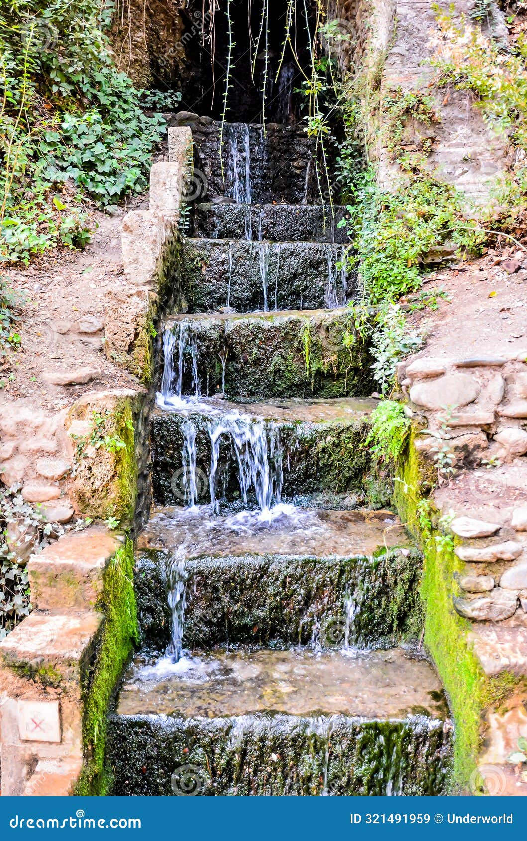 A Stone Staircase with a Waterfall on Top Stock Image - Image of ...