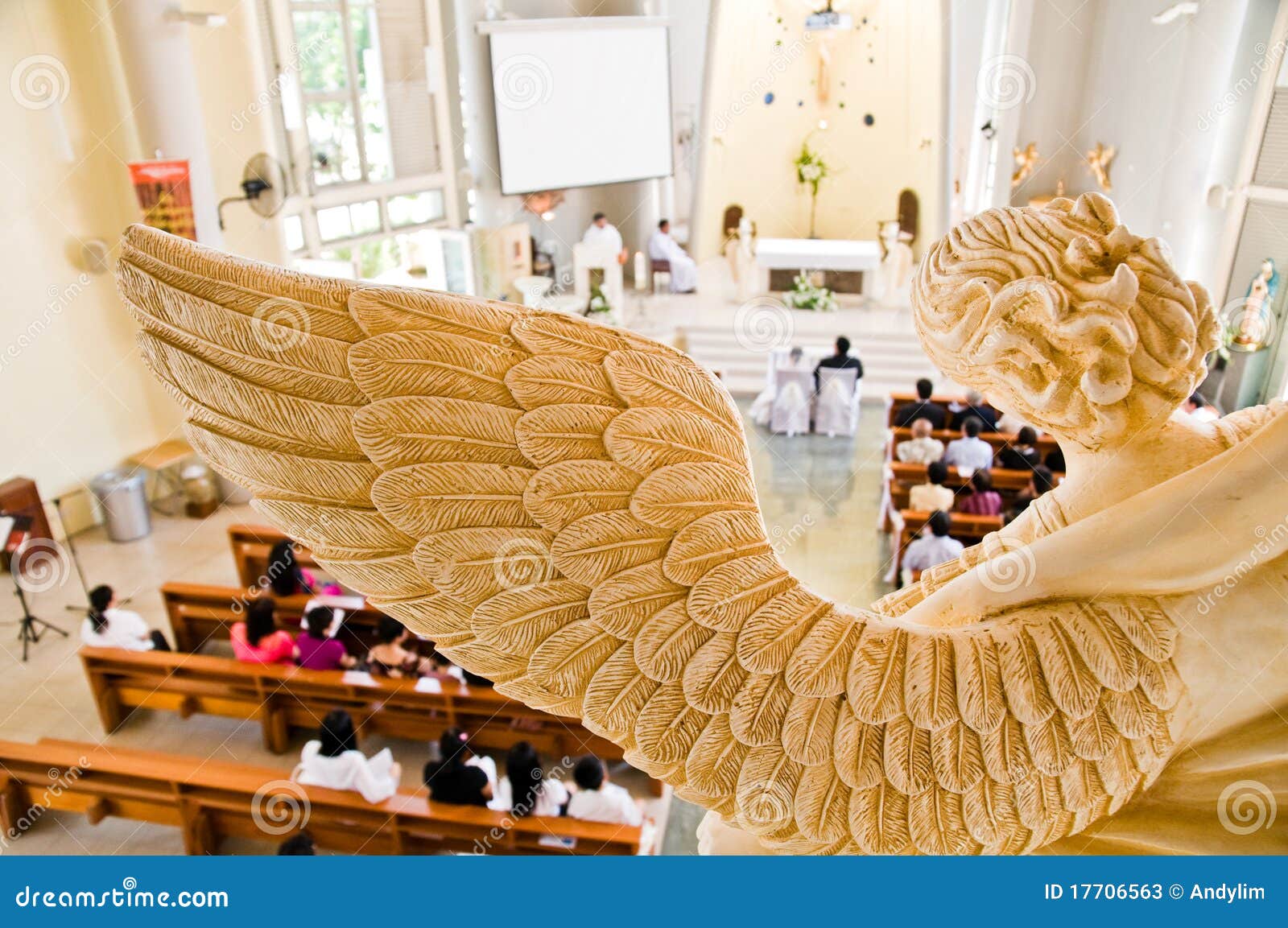 Stone Statue of Angel Overlooking Wedding Ceremony Stock Image - Image ...