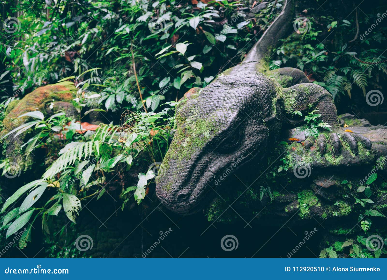Stone Lizard Statue Covered with Moss Stock Photo - Image of balinese ...