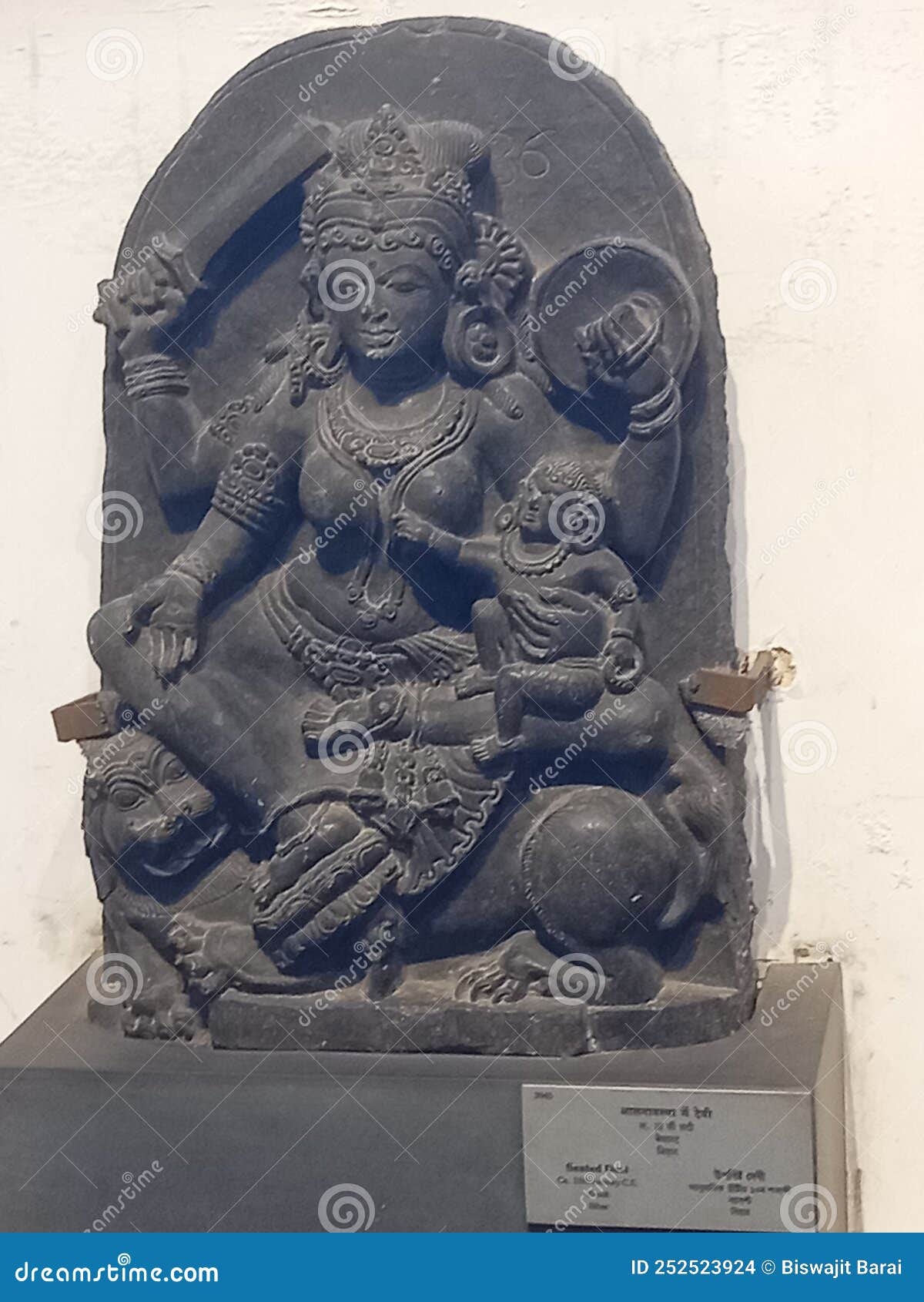 Stone statue, Seated Devi. editorial stock image. Image of head - 252523924