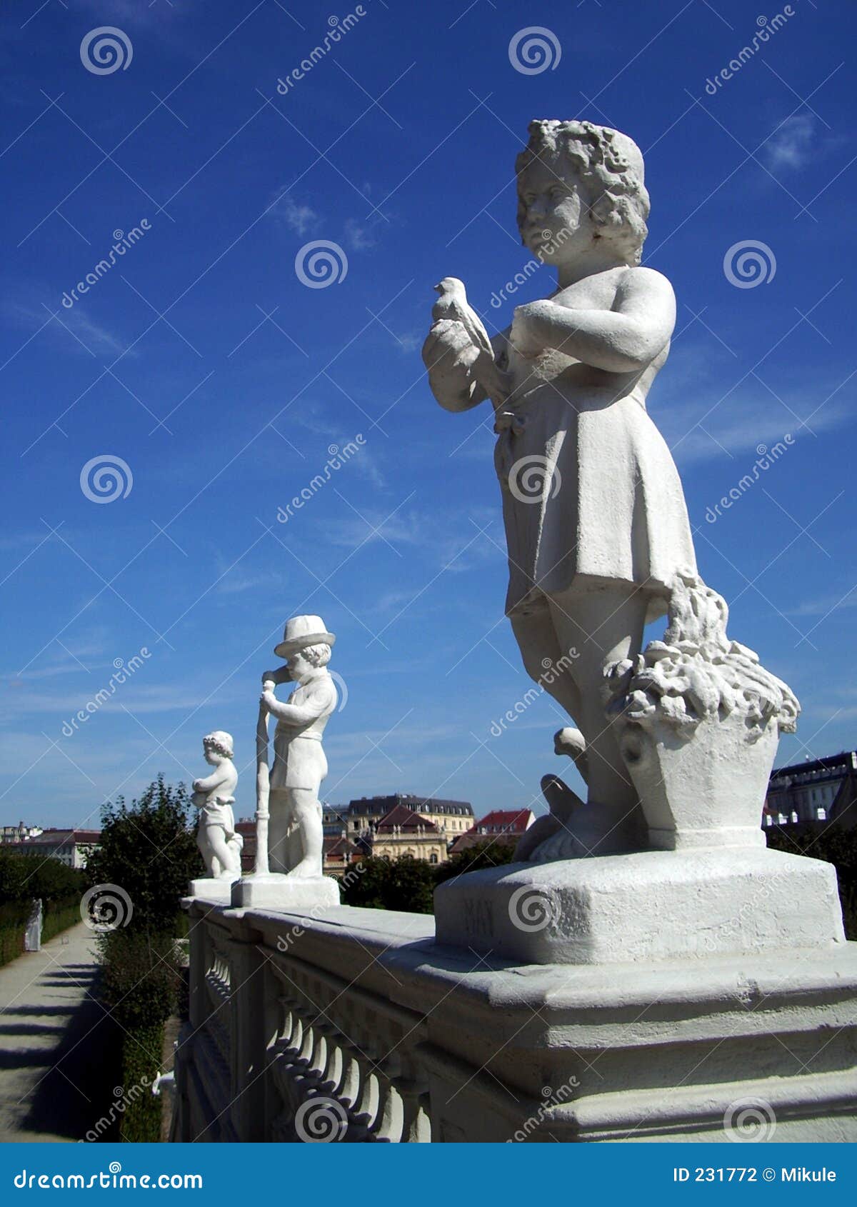 Stone Statues of Children stock photo. Image of building - 231772
