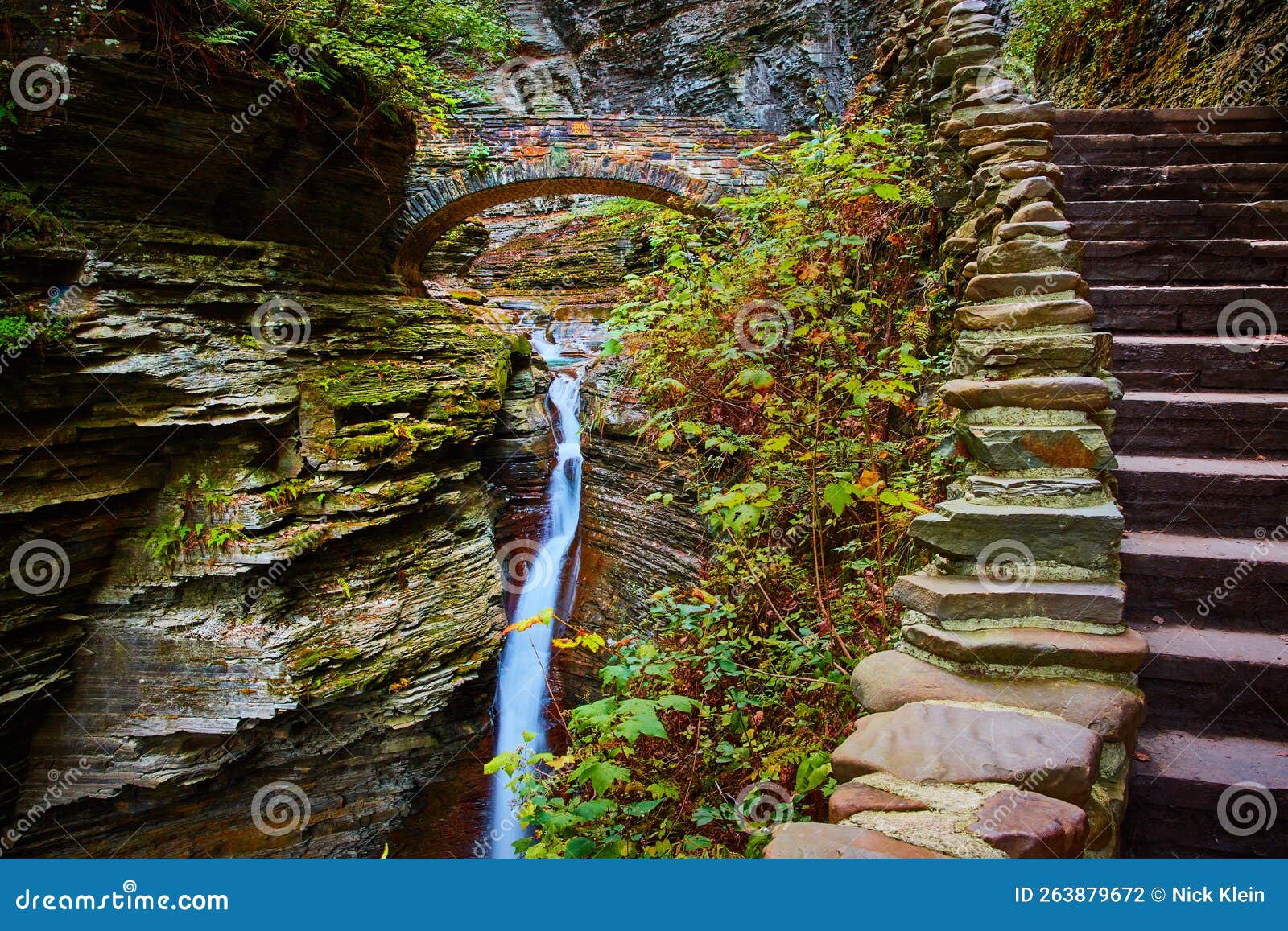 Stone Steps Along Gorge with Stone Arch Walking Bridge and Waterfalls ...
