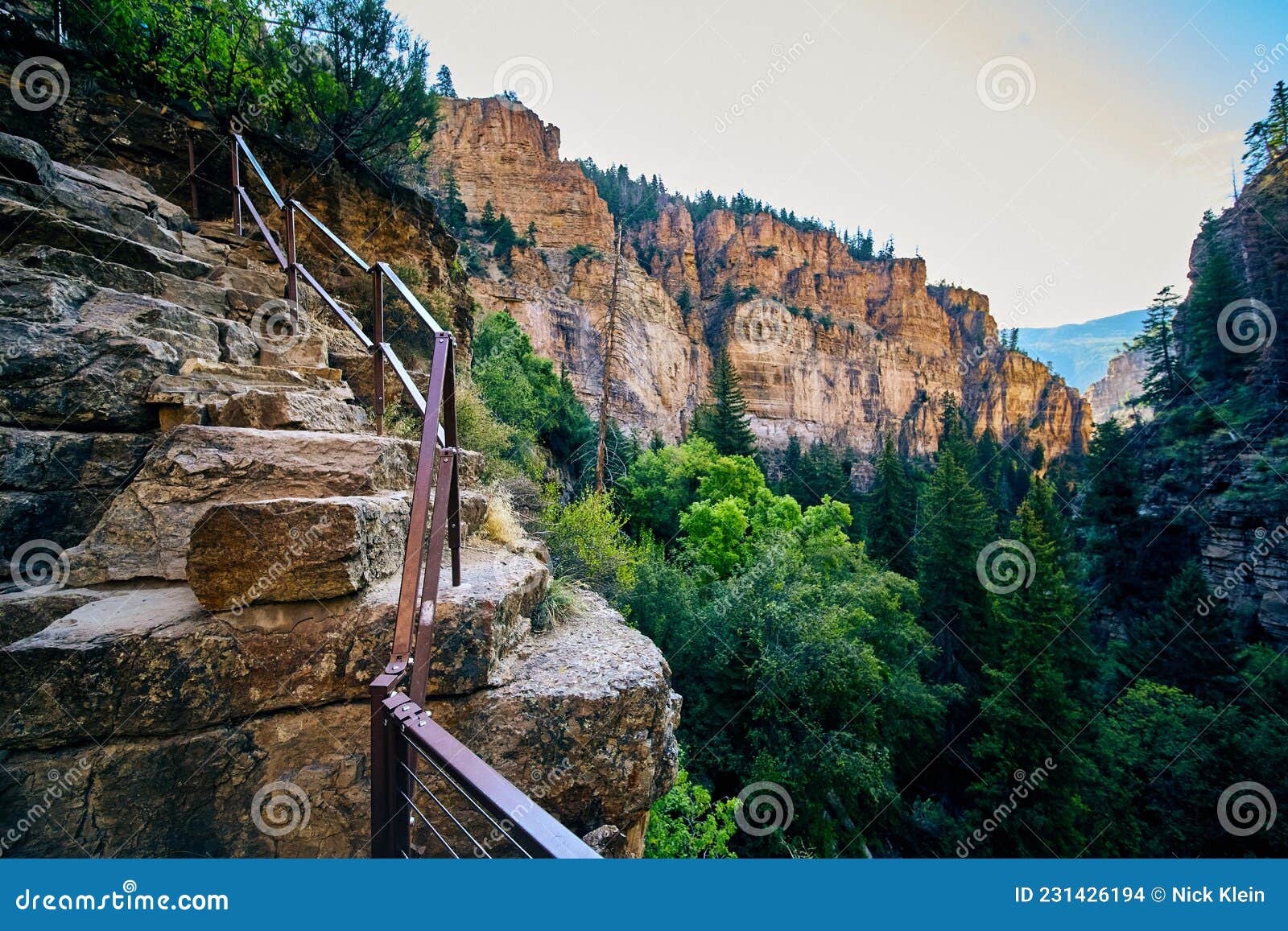 Stone Steps in Mountains with Metal Railing Leading Up Mountain with ...