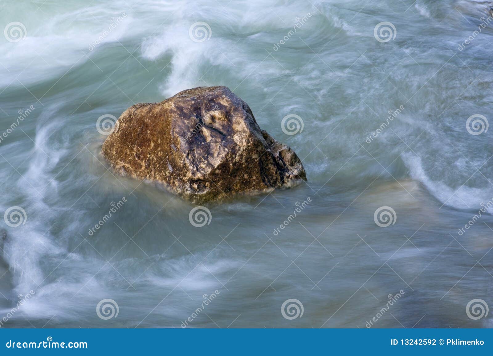 Stone in stream stock photo. Image of light, nature, fluid - 13242592