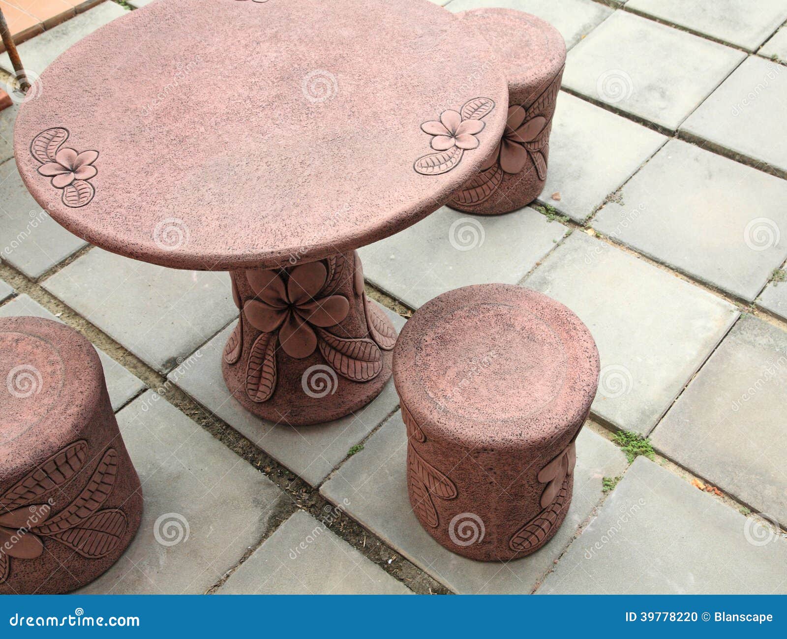 Stone Table and Chairs with Floral Pattern Stock Photo - Image of retro ...