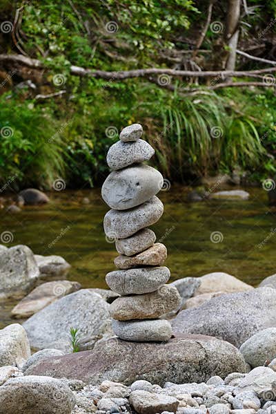 A stone tower by the river stock image. Image of created - 223701671